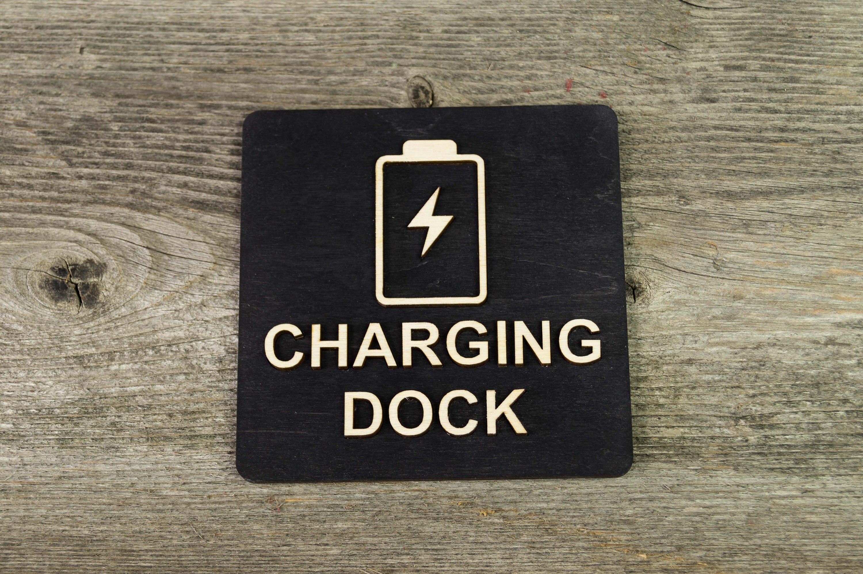 Charging station sign. Mobile devices recharge dock. Charge your phone ...